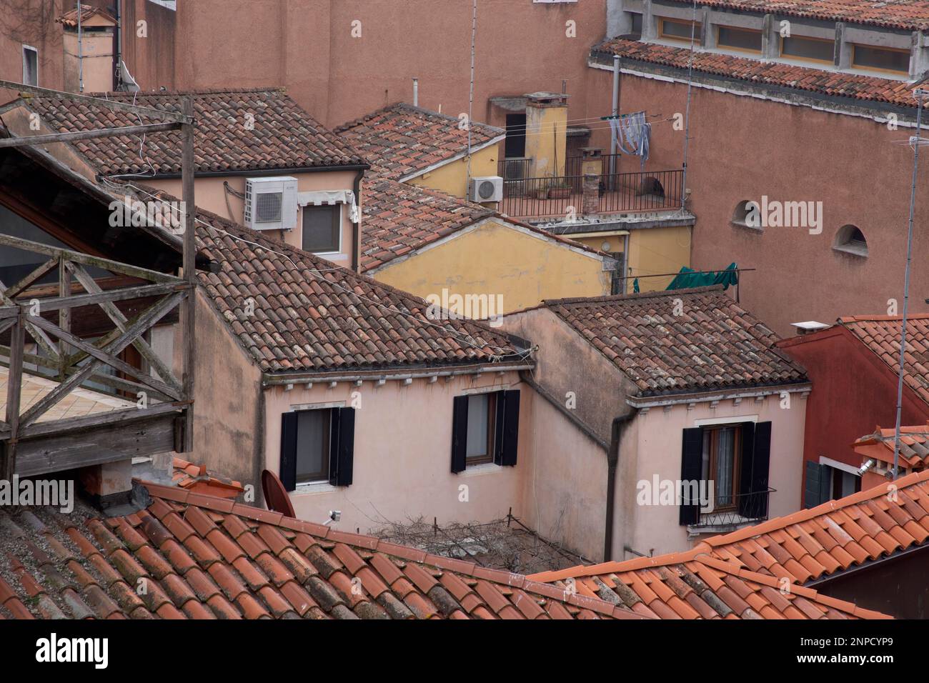 Buildings and rooftops crowded together in the city of Venice, Italy ...