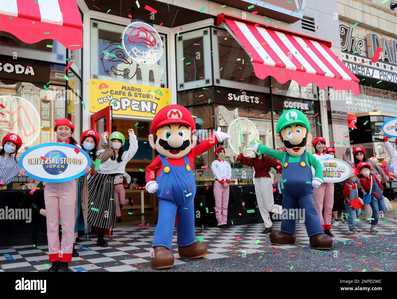 Mario and others attend the opening ceremony of Mario Café & Store at ...