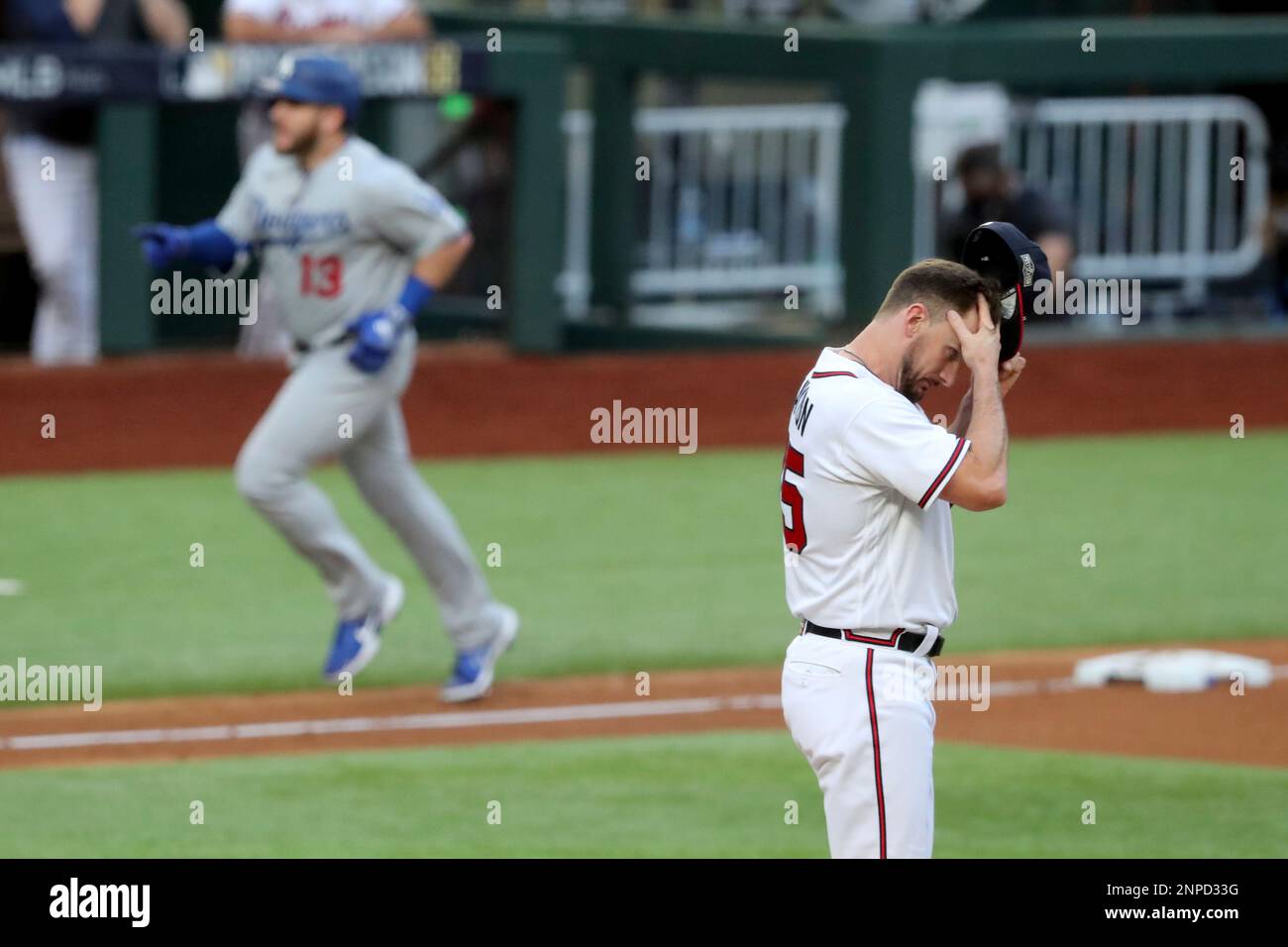 Atlanta Braves relief pitcher Grant Dayton, right, reacts as Los ...