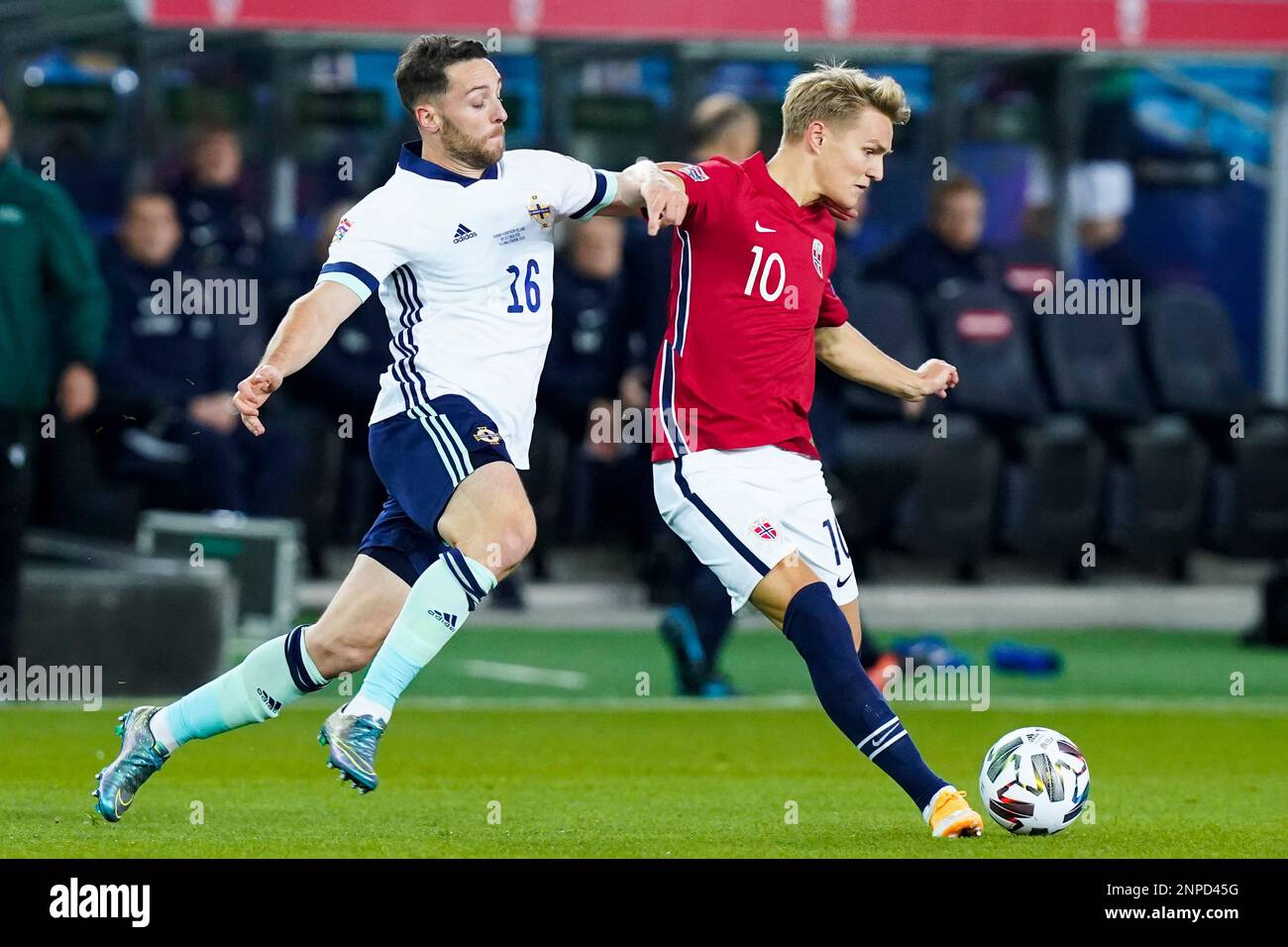 Northern Ireland's Conor Washington, left, and Norway's Martin Odegaard ...