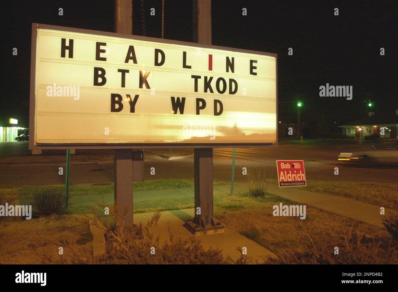 The sign is seen at Kyle Michael's Retail Liquor. (Jaime Oppenheimer ...