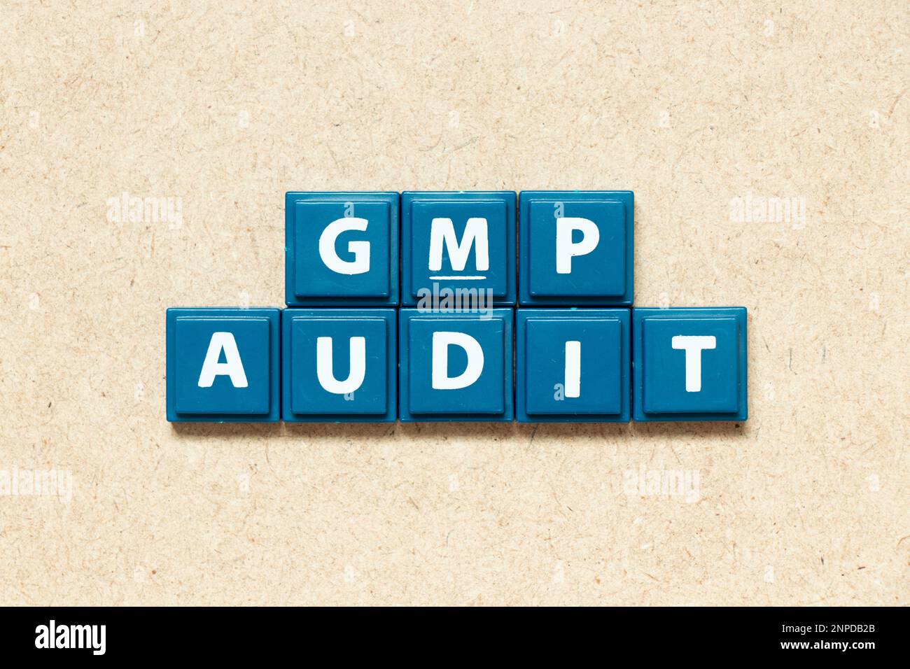 Tile alphabet letter in word GMP (Abbreviation of good manufacturing ...