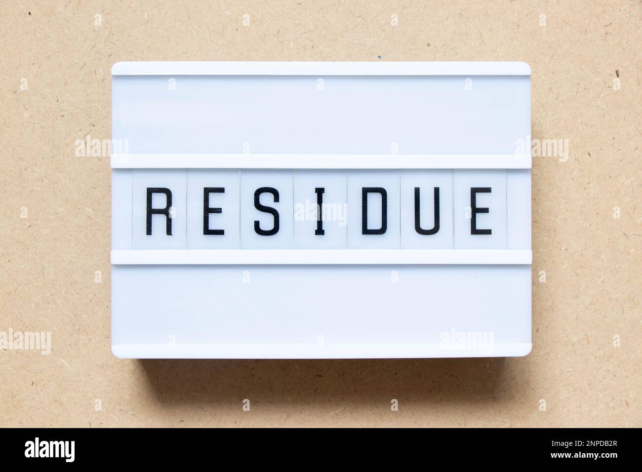Lightbox with word residue on wood background Stock Photo - Alamy