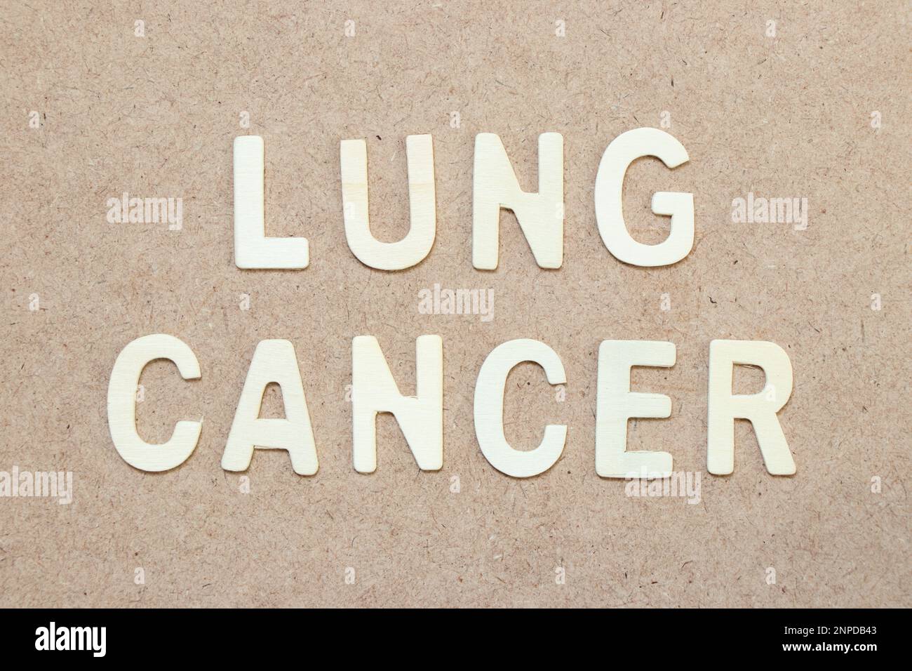 Wood alphabet letter in word lung cancer on wood background Stock Photo ...