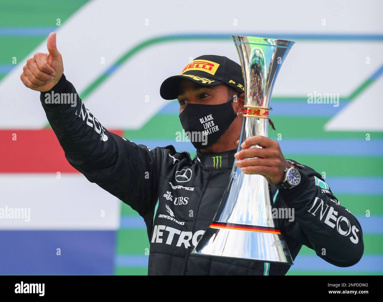 Mercedes driver Lewis Hamilton of Britain celebrates on the podium ...
