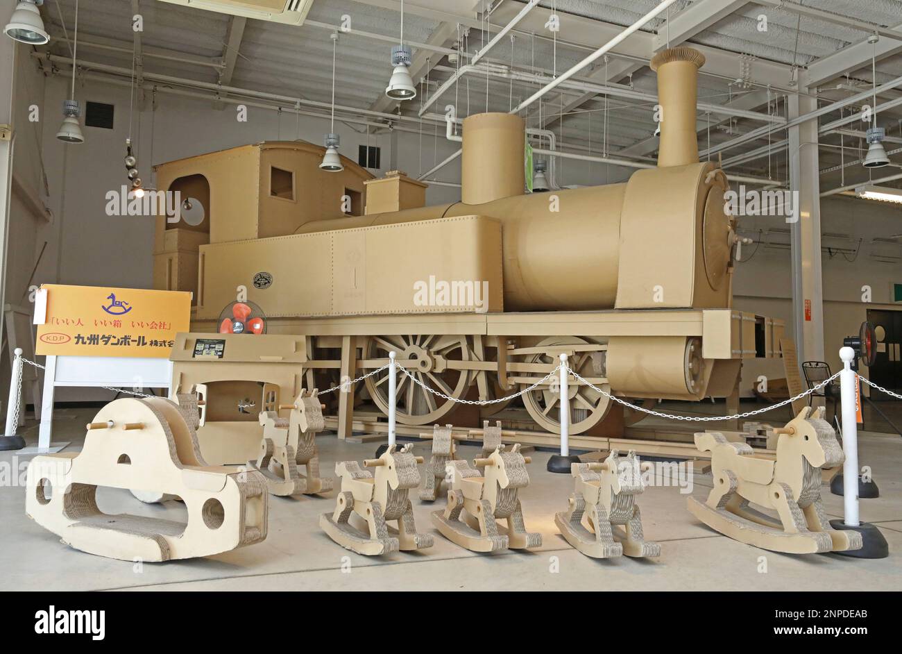 A photo shows a full-scale cardboard steam locomotive (SL) in Nankan ...