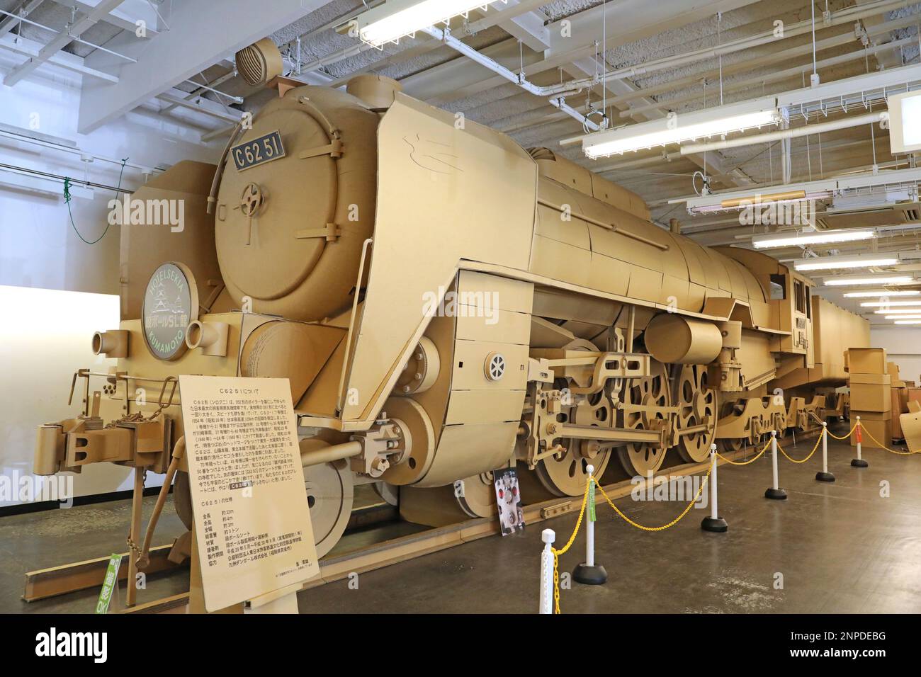 A photo shows a full-scale cardboard steam locomotive (SL) in Nankan ...