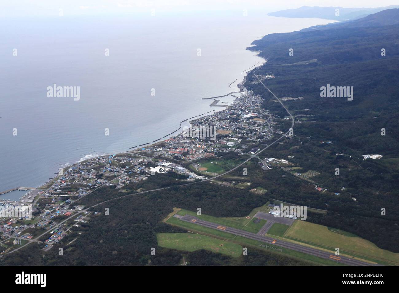 An aerial photo shows the cityscape of Shikabe Town, Hokkaido ...