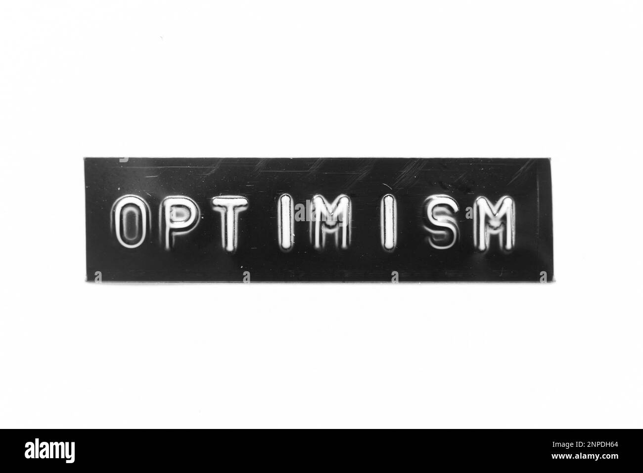 Black color banner that have embossed letter with word optimism on ...