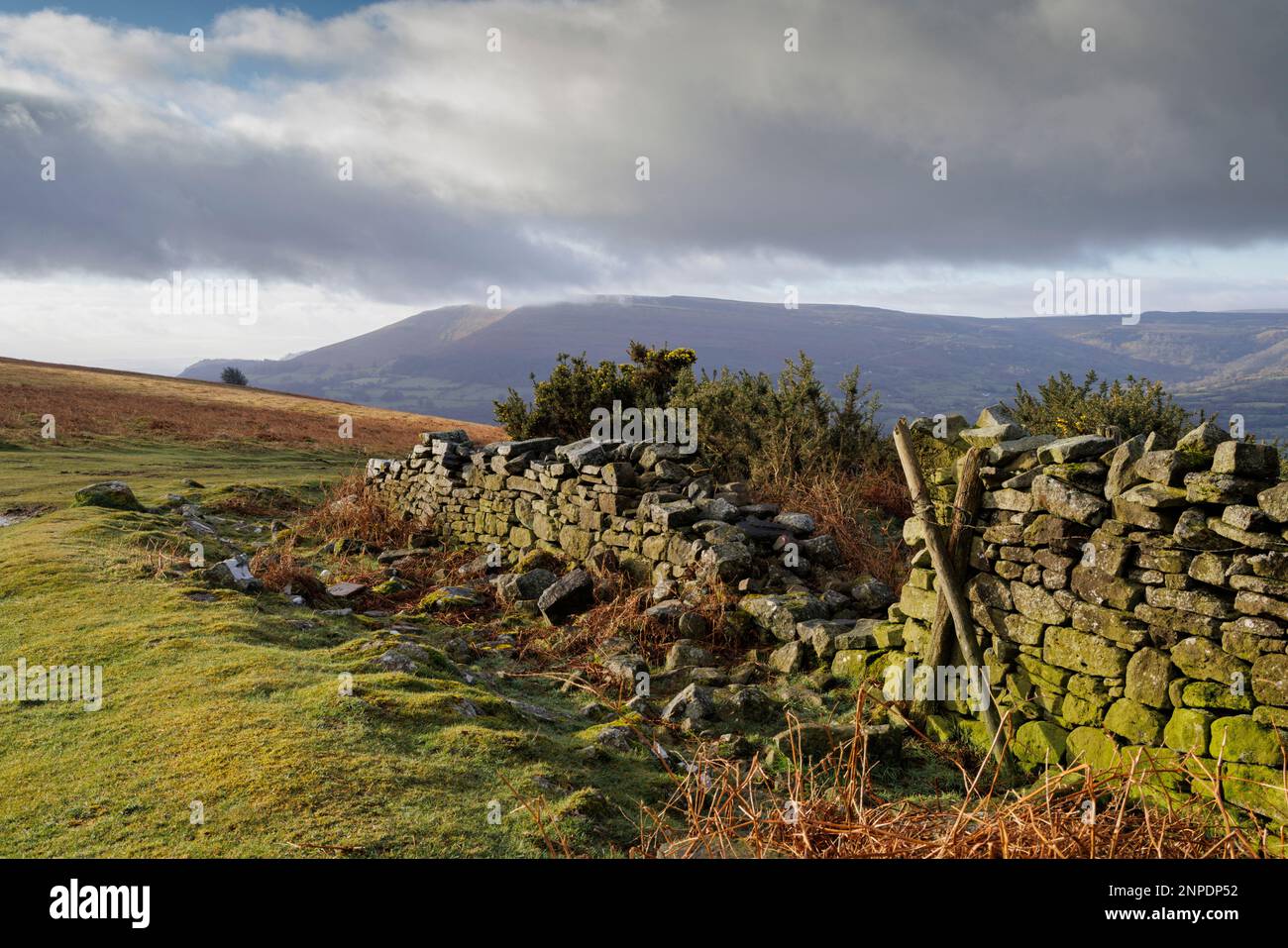Crumbling stone wall in the South Wales Mountains Stock Photo - Alamy