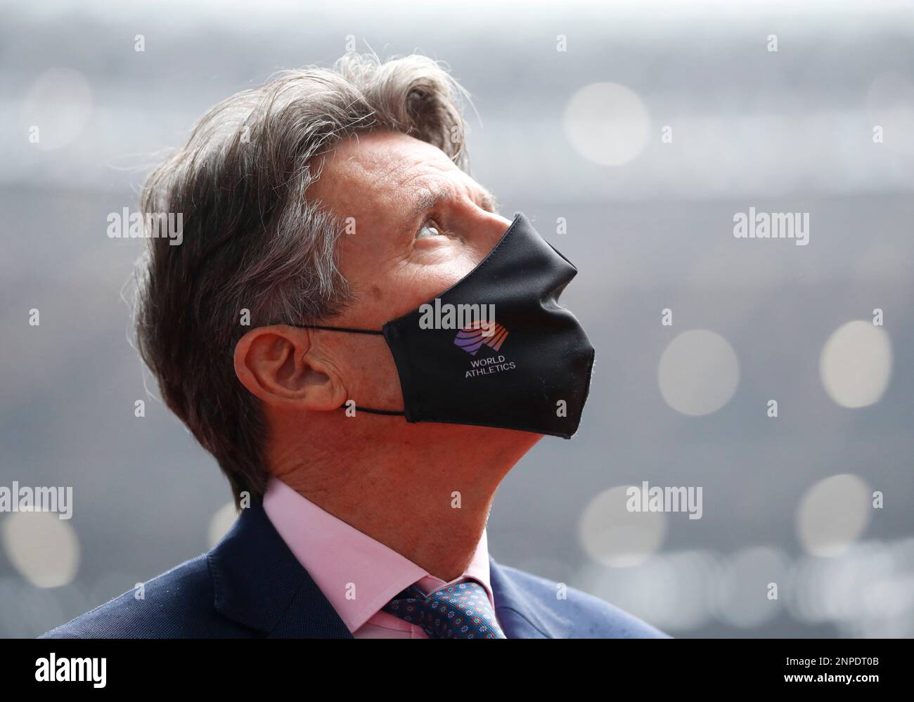 World Athletics President Sebastian Coe wearing a protective face mask ...