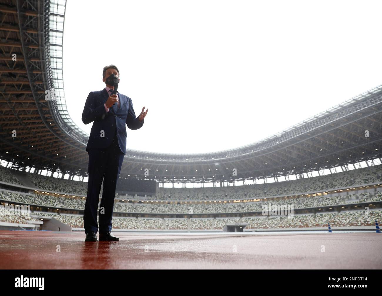 World Athletics President Sebastian Coe wearing a protective face mask ...