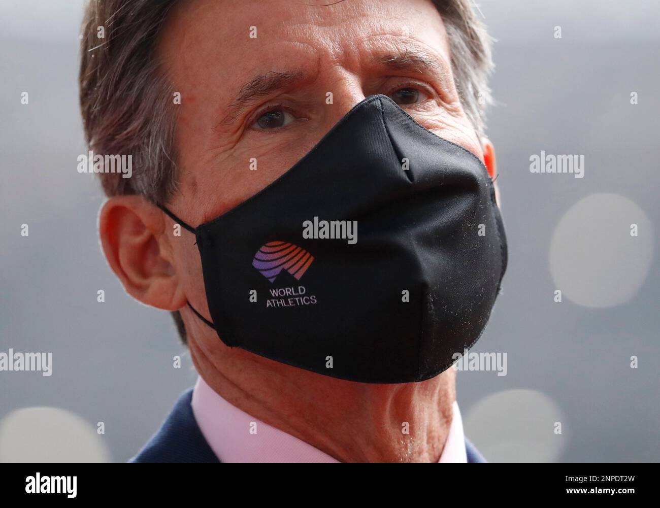World Athletics President Sebastian Coe wearing a protective face mask ...