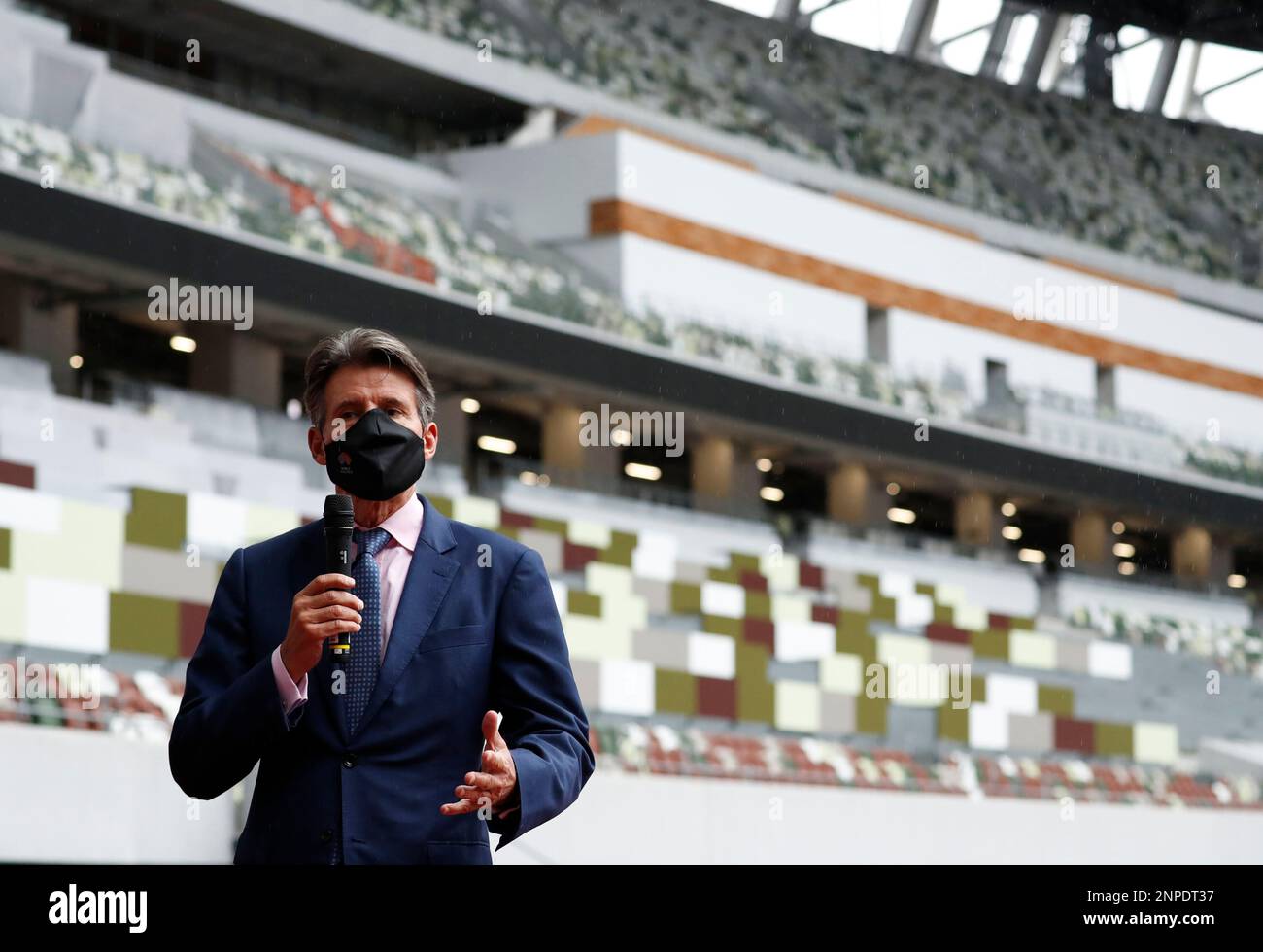 World Athletics President Sebastian Coe wearing a protective face mask ...