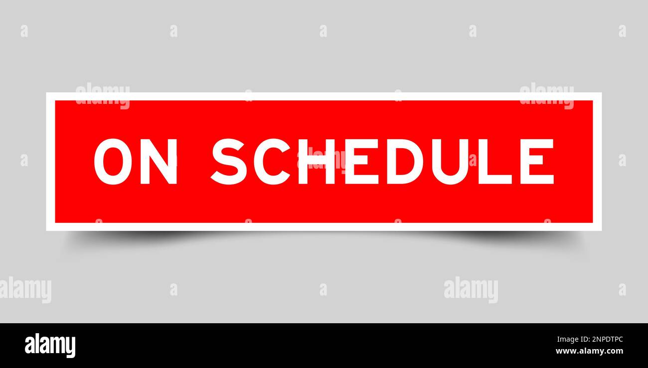 Red color square shape sticker label with word on schedule on gray ...