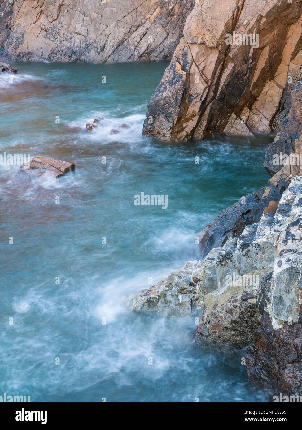 Remains of some rock steps from the sea at Plemont beach Stock Photo ...