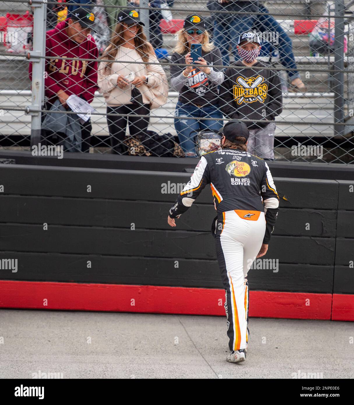 Noah Gragson walks across the track to greet fan prior to the NASCAR ...