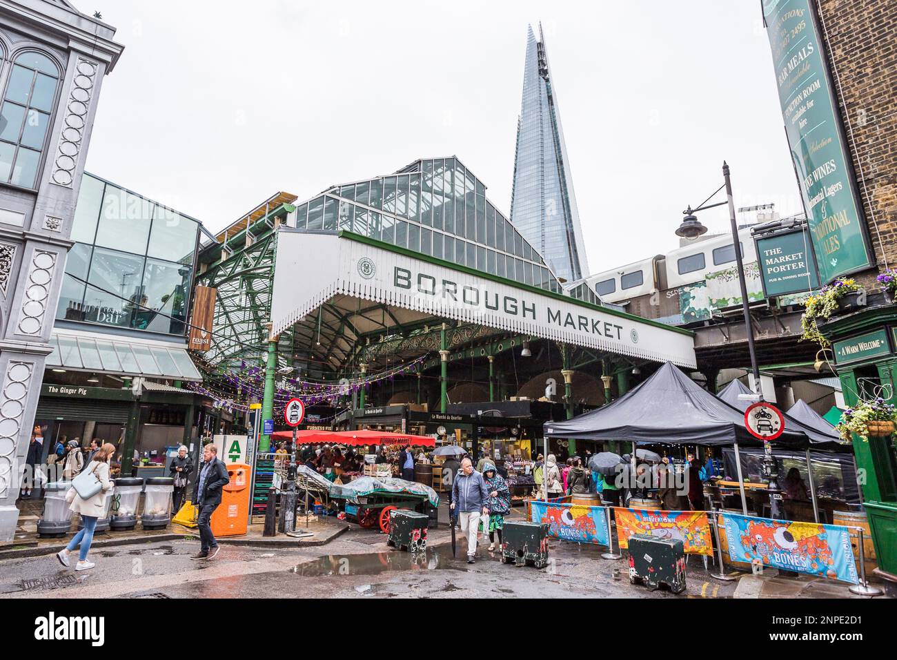 The indoor Borough Market pictured under the towering Shard Building in ...