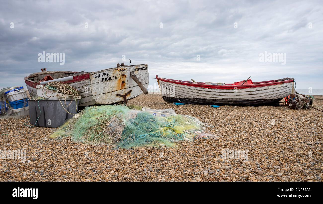 Colourful fishing nets and fishing boats pictured on Aldeburgh Beach on ...