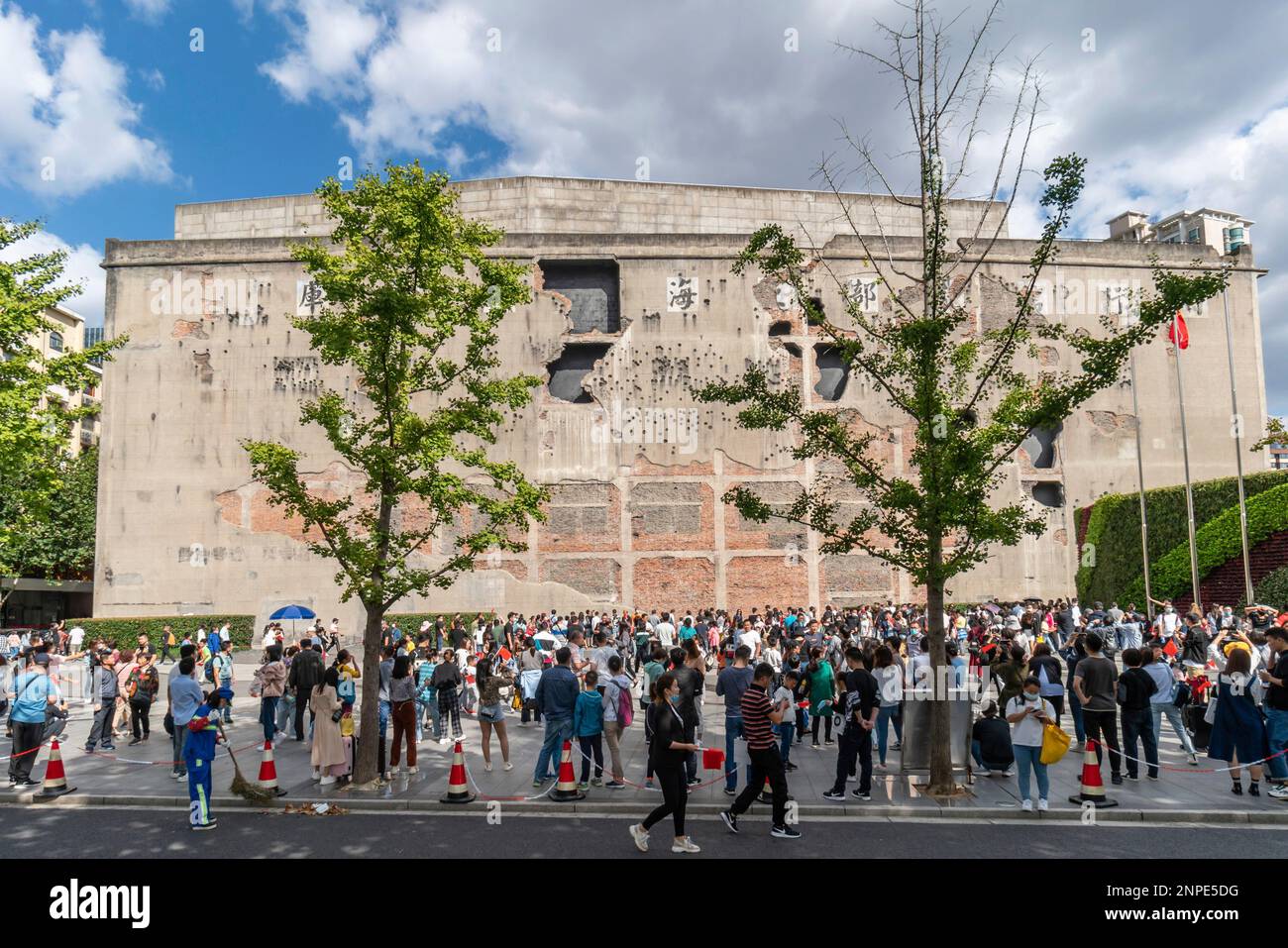 Tourists visit the iconic wall of Sihang warehouse, which witnessed a ...