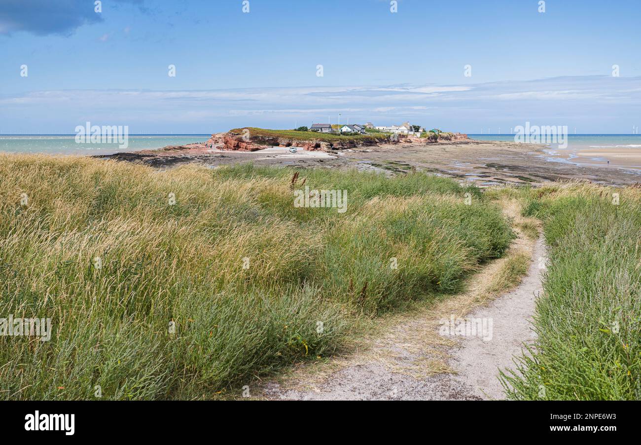 A pathway curves and descends down the edge of Middle Eye towards ...