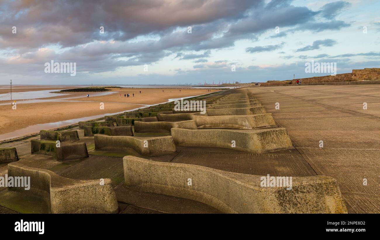 A panorama of Moreton Beach and the unusual concrete sea defence on the ...