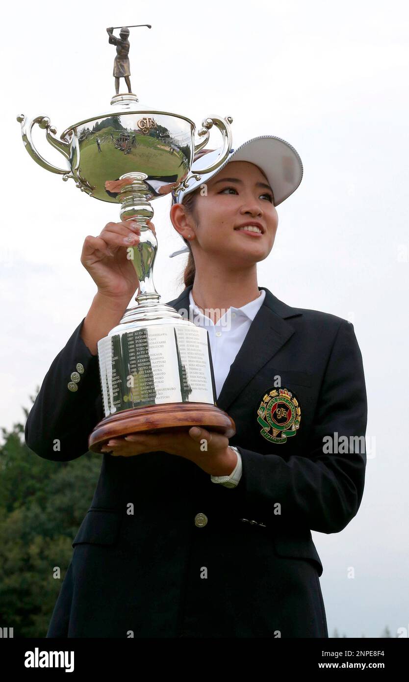 Erika Hara holds a championships' trophy after winning the Japan Women ...