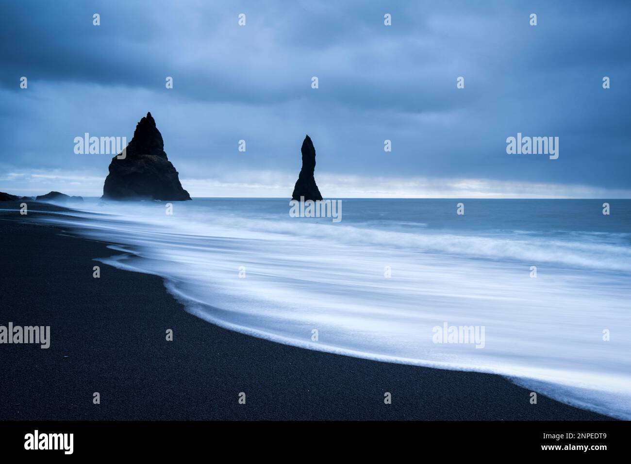 Moody skies over the sea stacks at Reynisdrangar beach in Iceland Stock ...