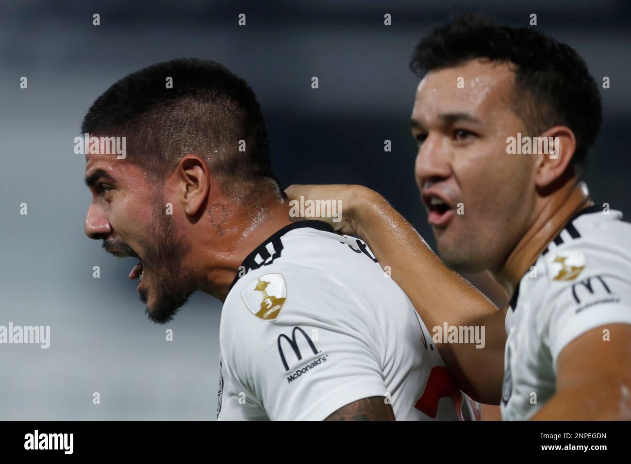 Jorge Recalde of Paraguay's Olimpia, left, celebrates his goal against ...