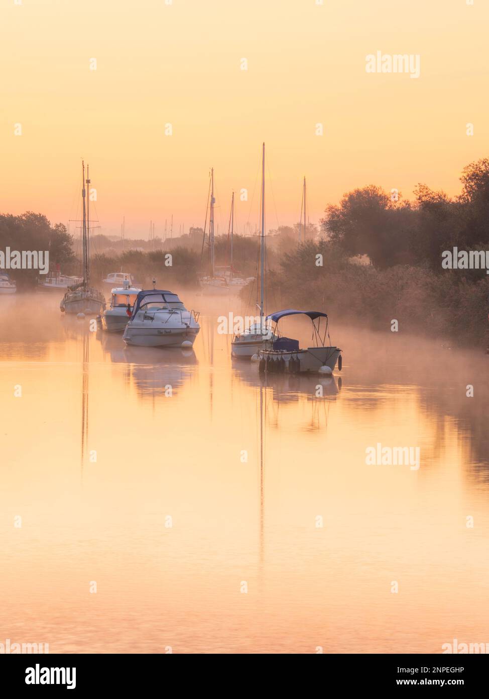 Boats on the River Frome at Wareham on a misty morning Stock Photo - Alamy