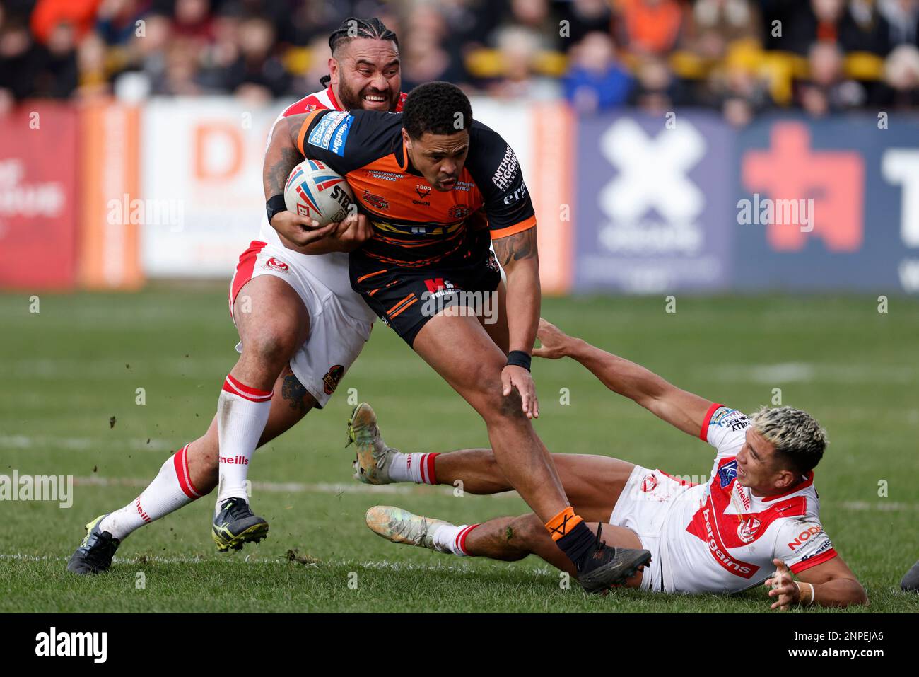 Castleford Tigers Jordan Turner is tackled by Saint Helens Konrad ...