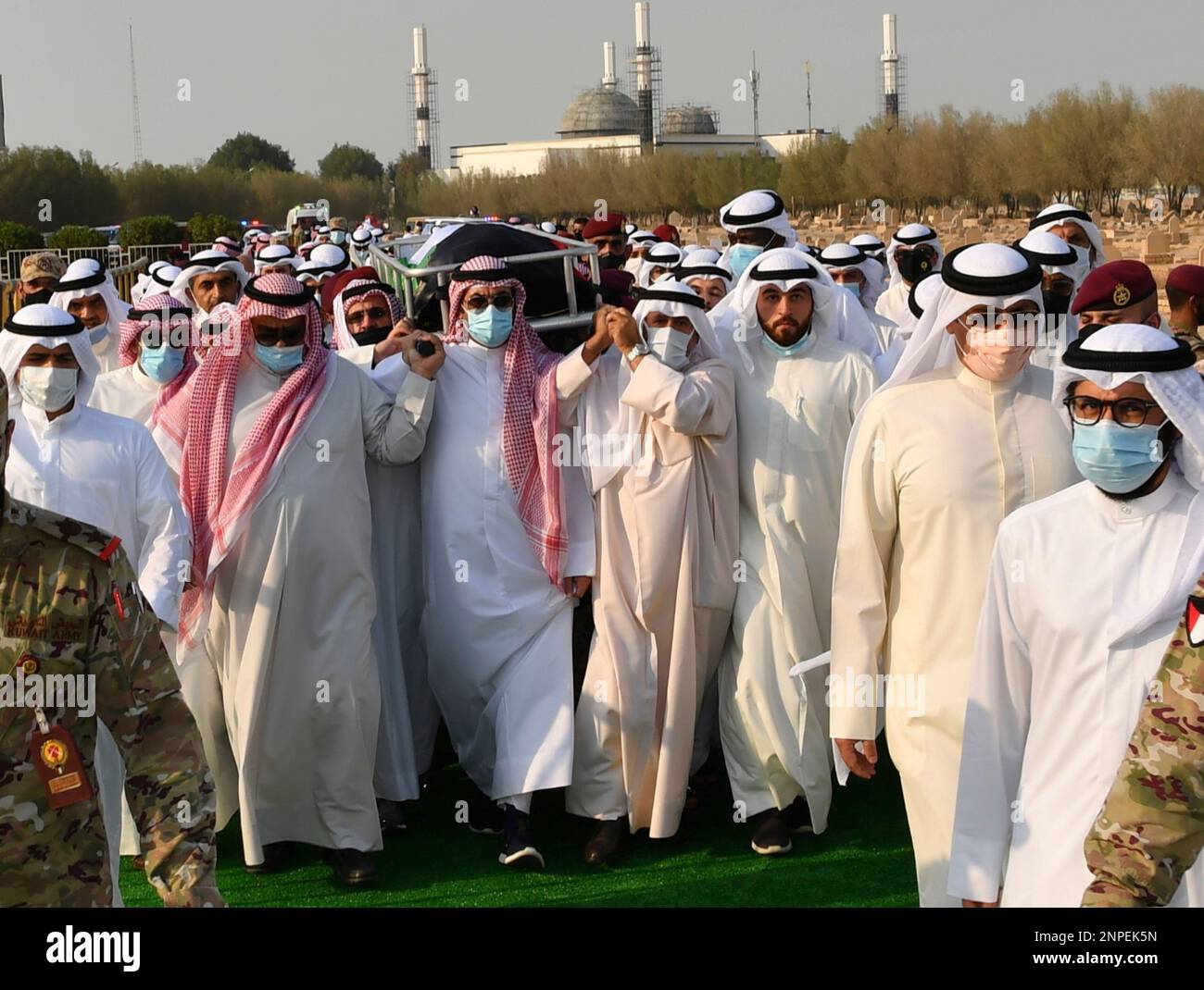 In this photo released by Diwan Al Amiri, the body of the late Emir of ...