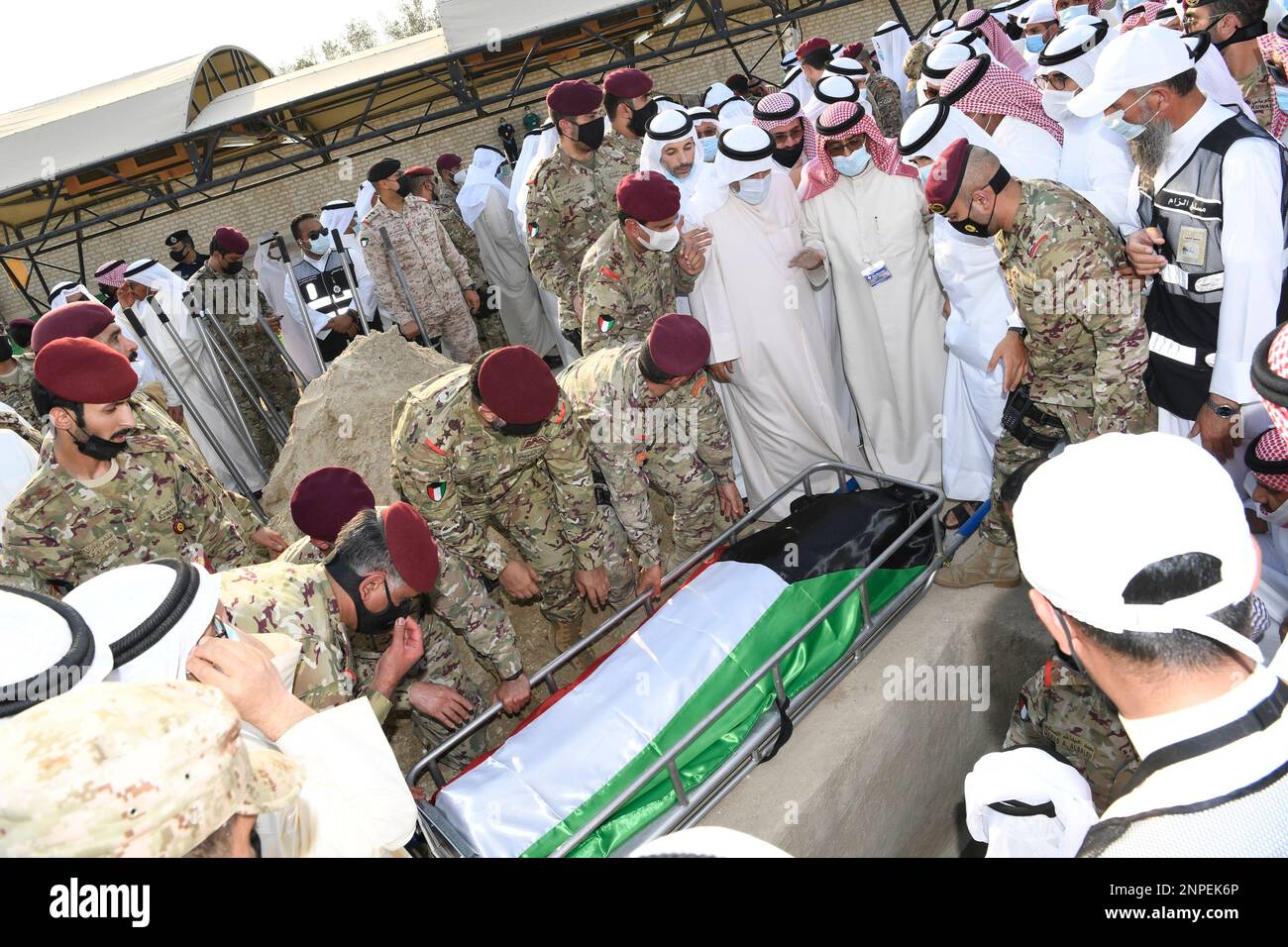 In this photo released by Diwan Al Amiri, the body of the late Emir of ...