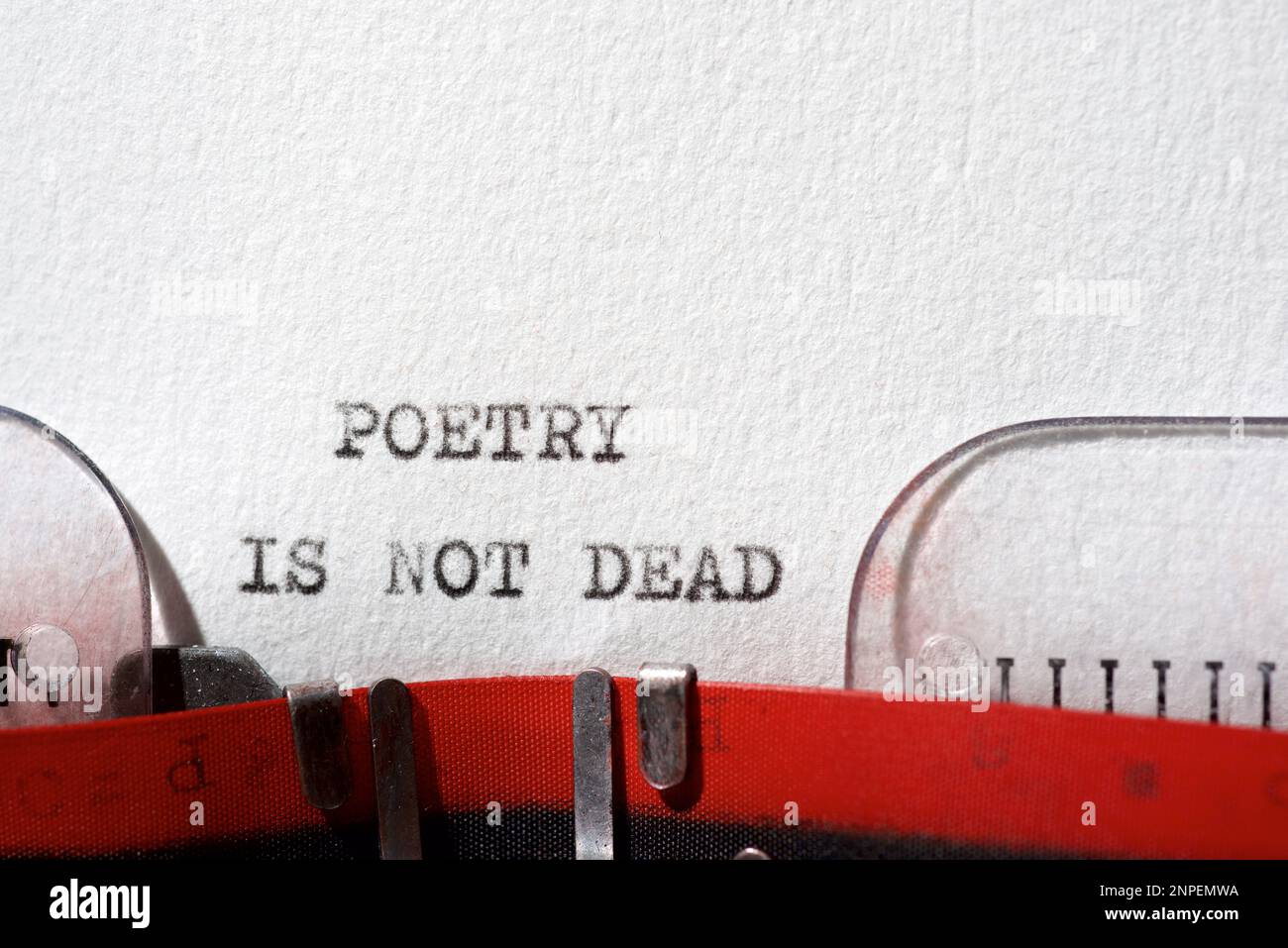 Poetry is not dead text written with a typewriter Stock Photo - Alamy