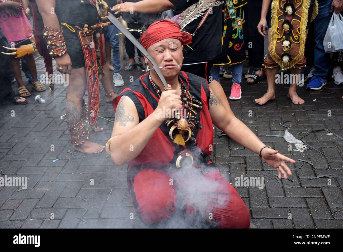 A man takes part in a parade a Chinese traditional culture with ...