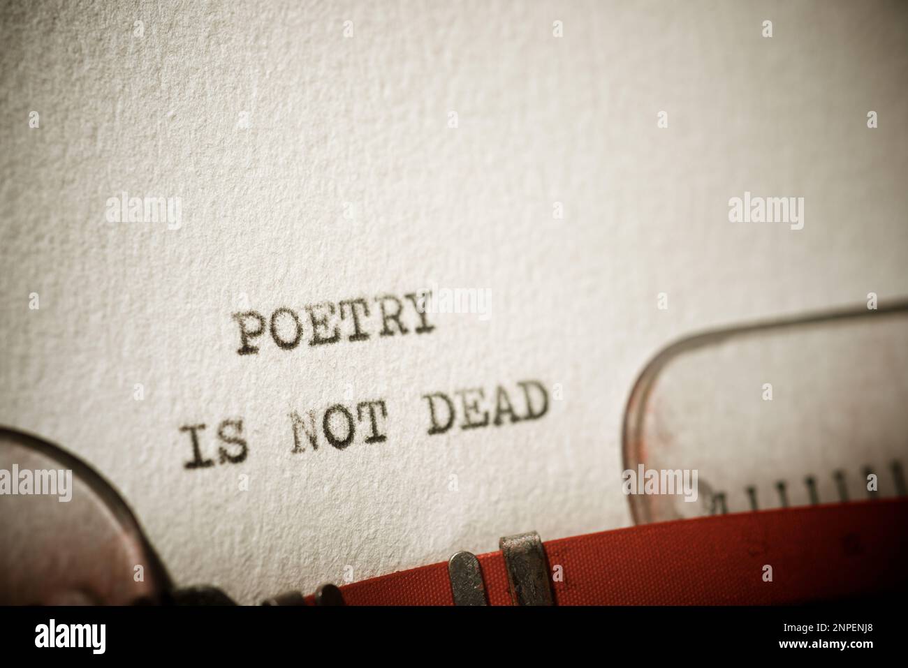 Poetry is not dead text written with a typewriter Stock Photo - Alamy