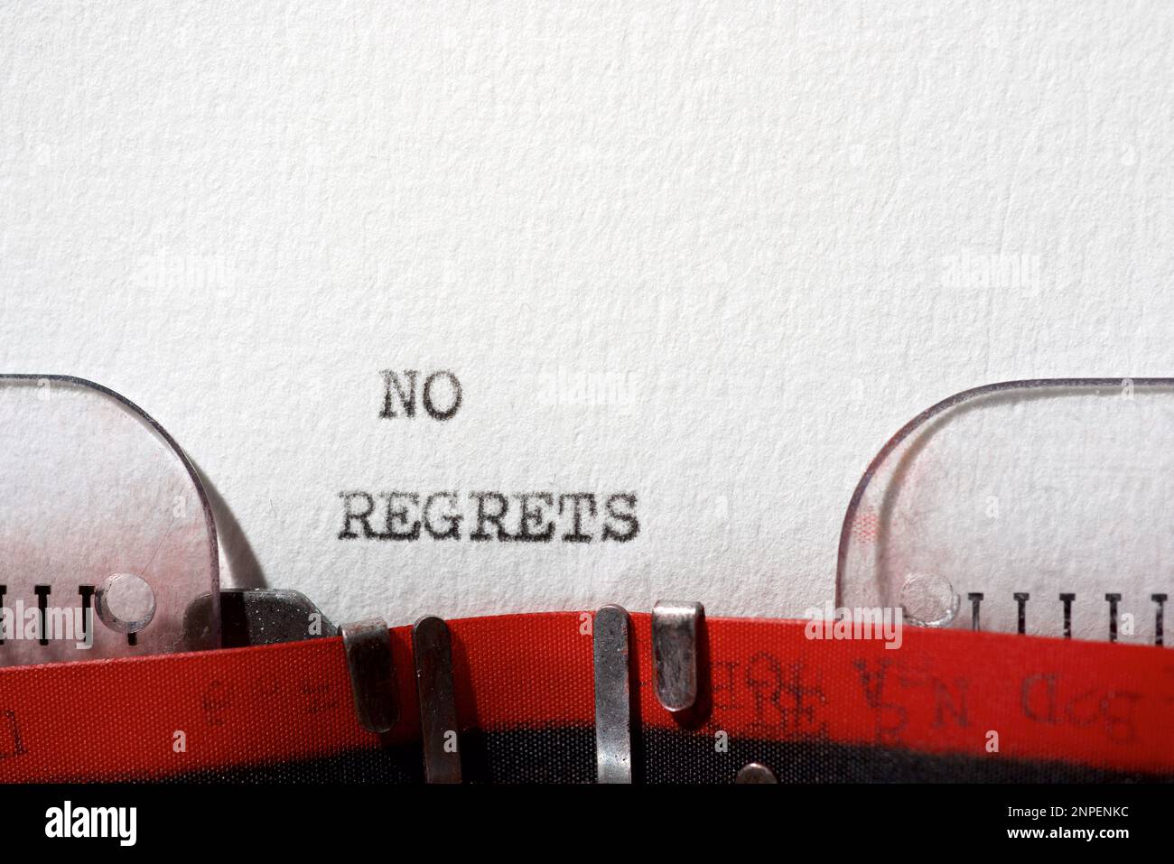 No regrets text written with a typewriter Stock Photo - Alamy