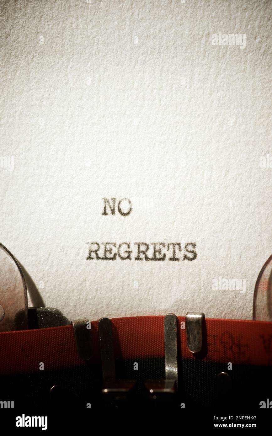 No regrets text written with a typewriter Stock Photo - Alamy