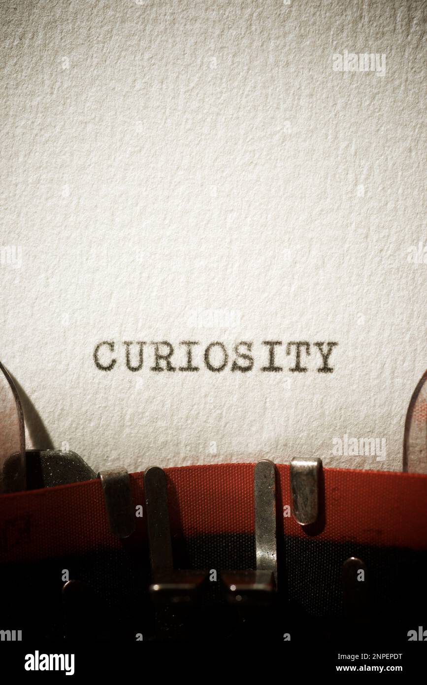 Curiosity word written with a typewriter Stock Photo - Alamy