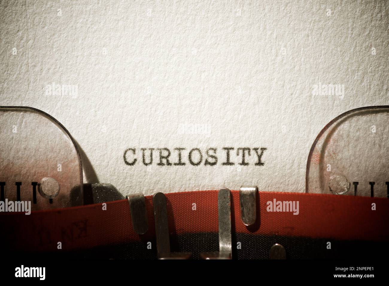 Curiosity word written with a typewriter Stock Photo - Alamy