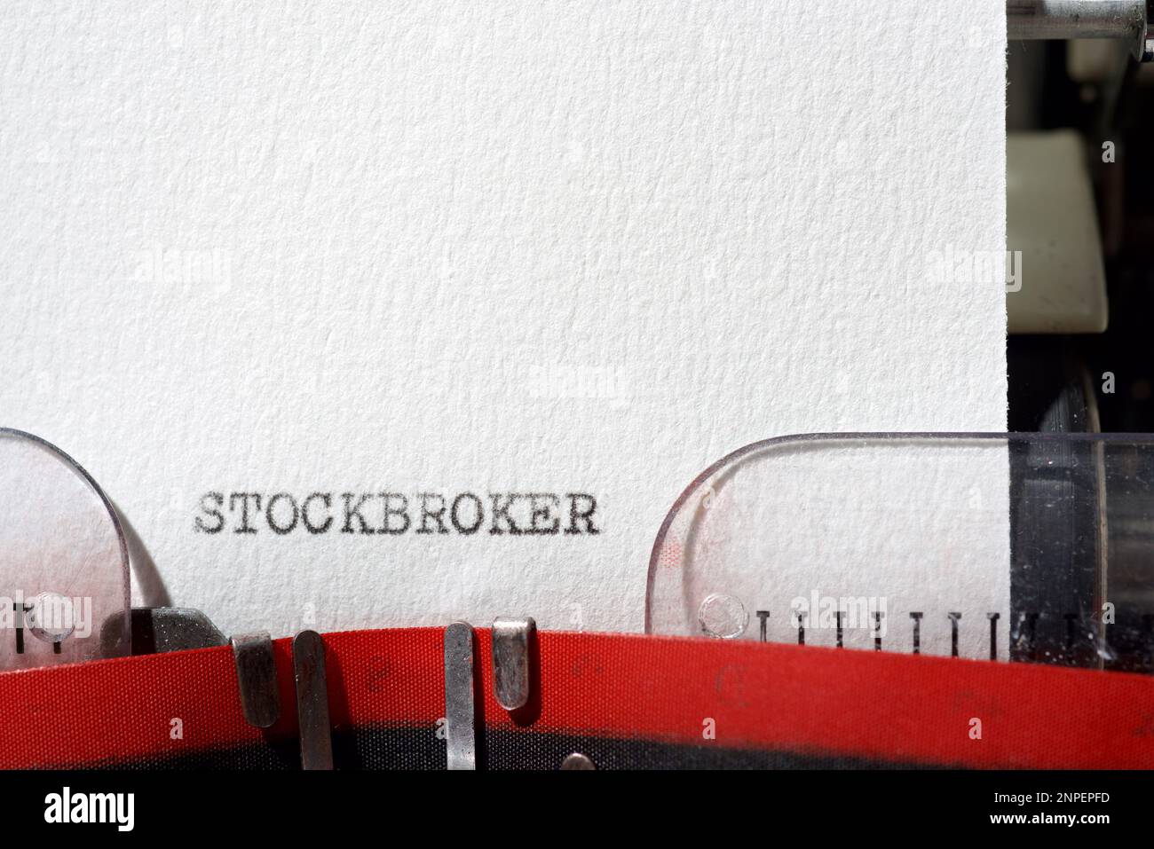Stockbroker word written with a typewriter Stock Photo - Alamy