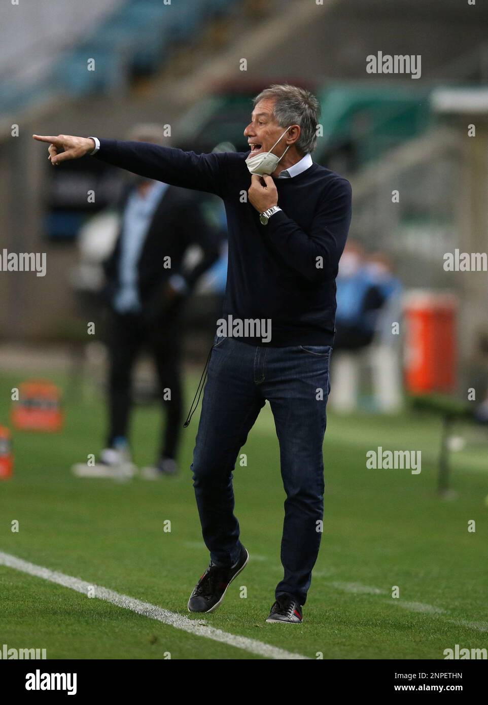 Coach Ariel Holan of Chile's Universidad Catolica gives instructions to ...