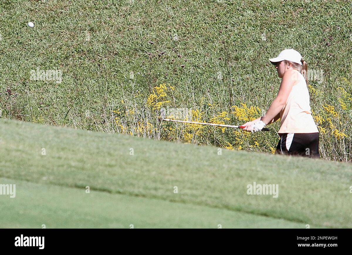 Greenback's Emily Tipton chips onto the green during the Girls Region 2 ...