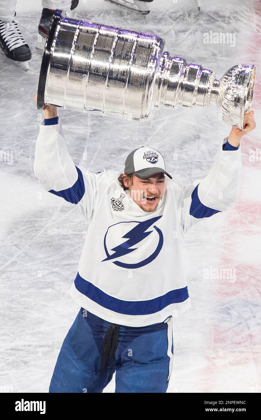 Tampa Bay Lightning's Anthony Cirelli (71) hoists the Stanley Cup to ...