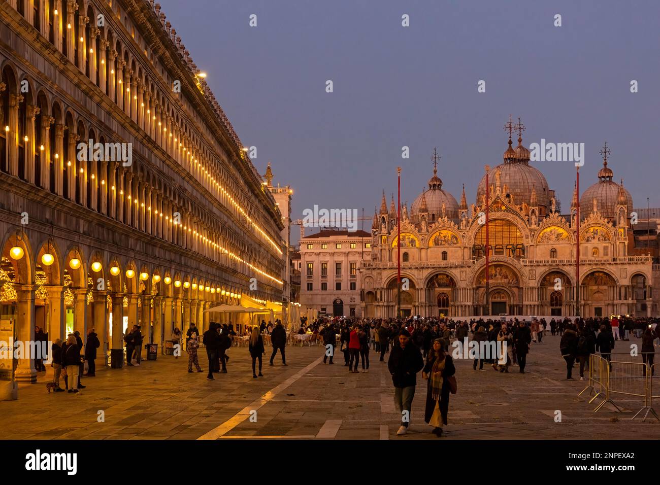 Crowds flocks to St Marks Square at twilight during Carnival at Venice ...