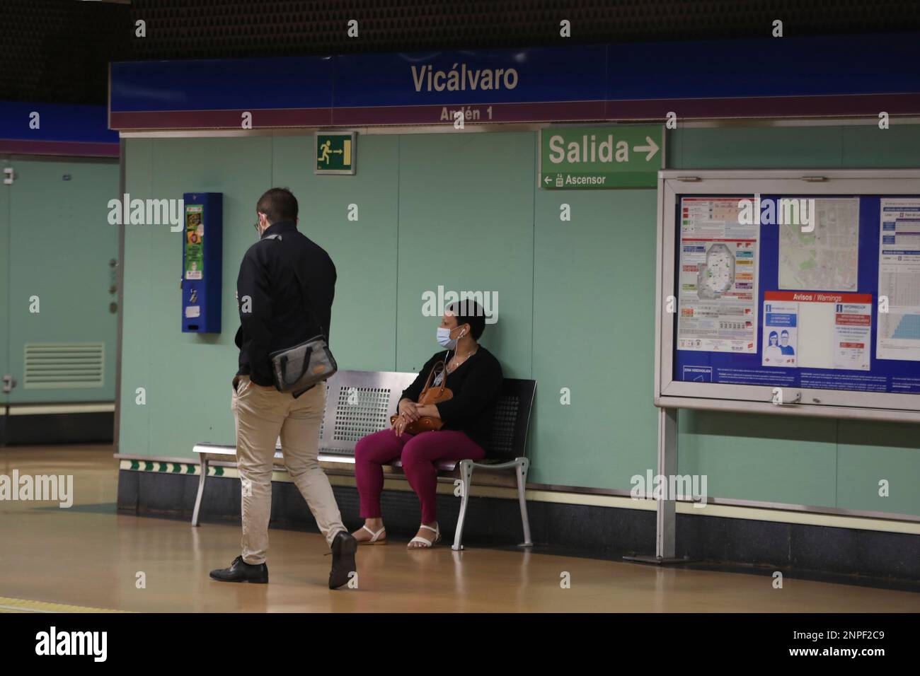 Two people are waiting on the platform of the Vicálvaro metro, Madrid ...
