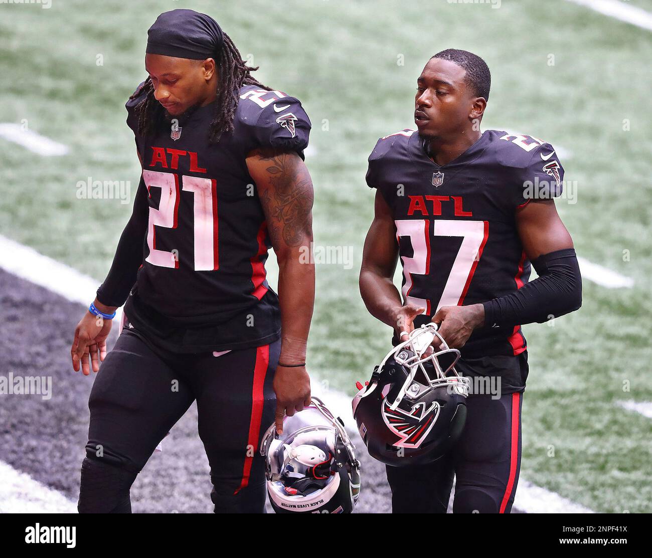 Atlanta Falcons running back Todd Gurley, left, and Damontae Kazee walk ...