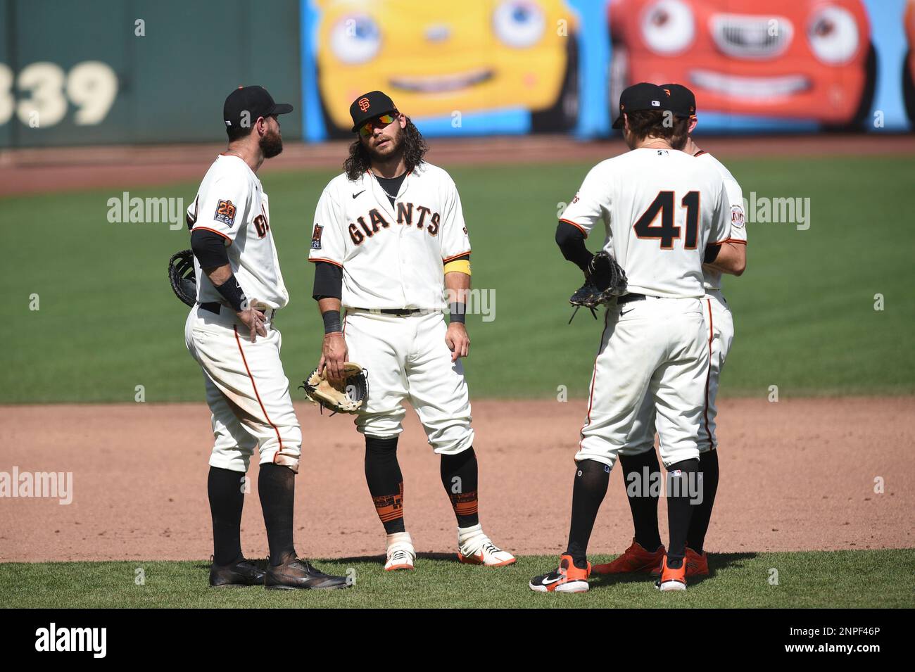 SAN FRANCISCO, CA - SEPTEMBER 27: San Francisco Giants infielders, from left, first baseman ...