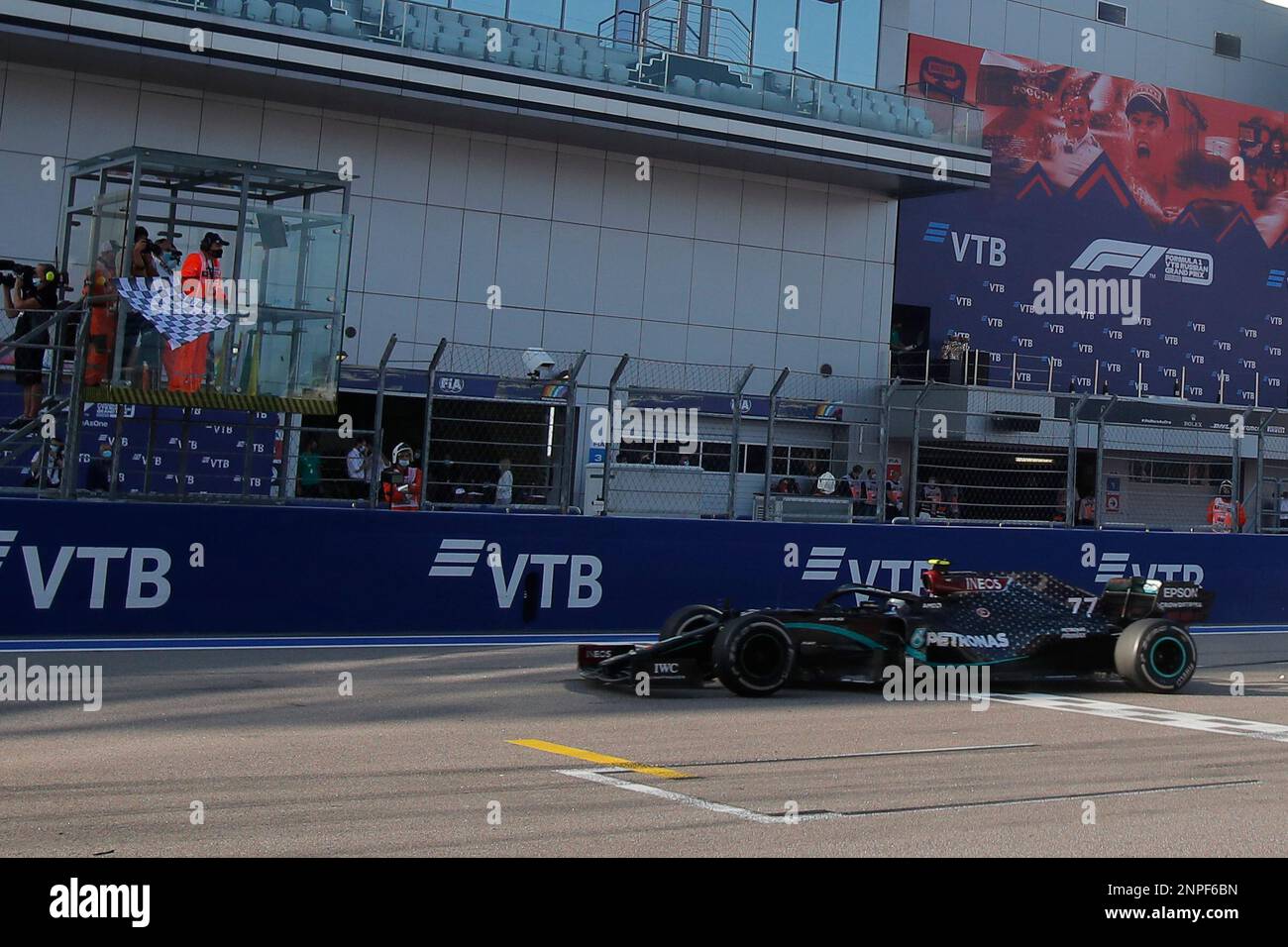 Mercedes driver Valtteri Bottas of Finland crosses the finish line to ...