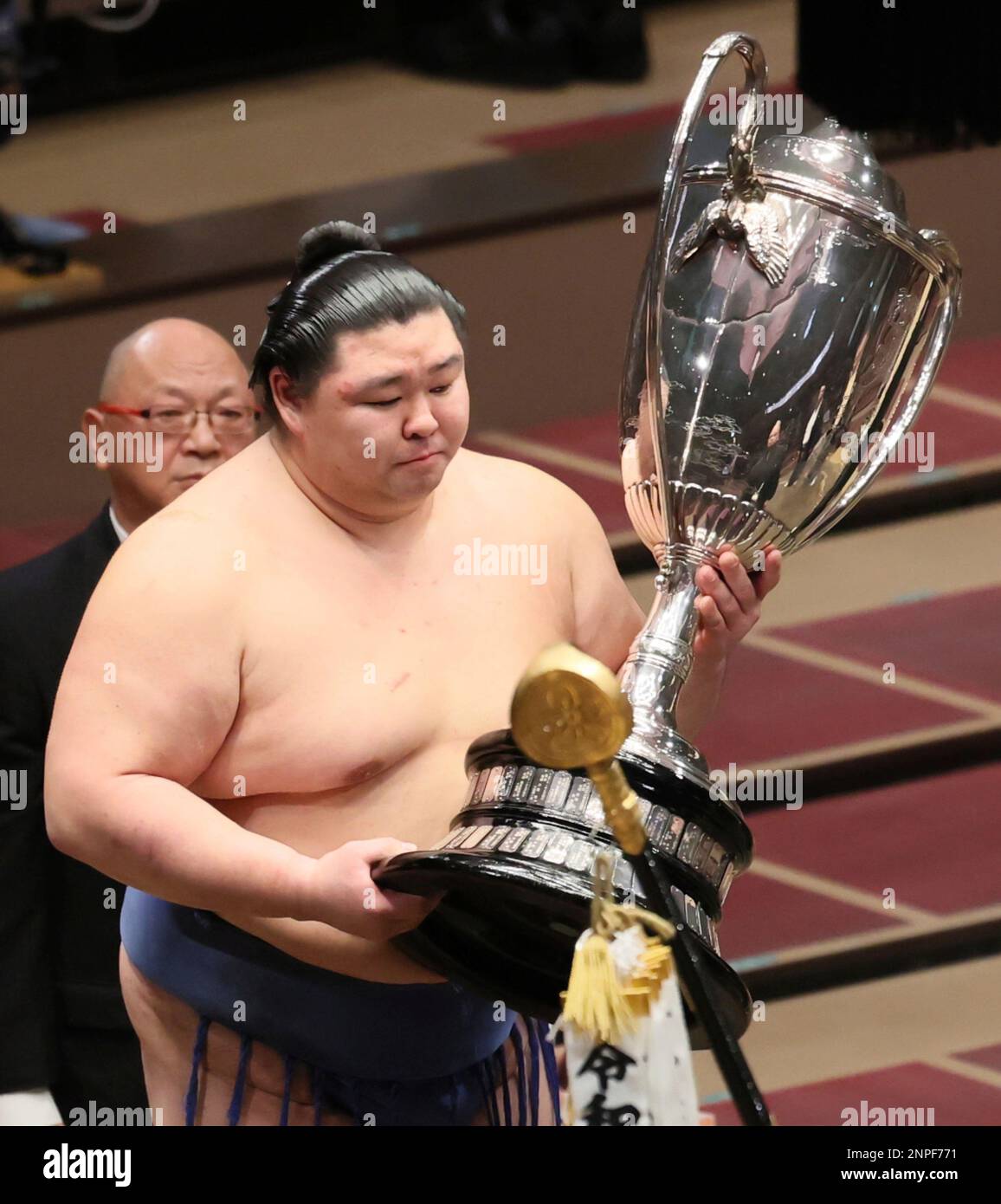 Japanese Sekiwake Shodai receives the Emperor's Cup after winning the ...